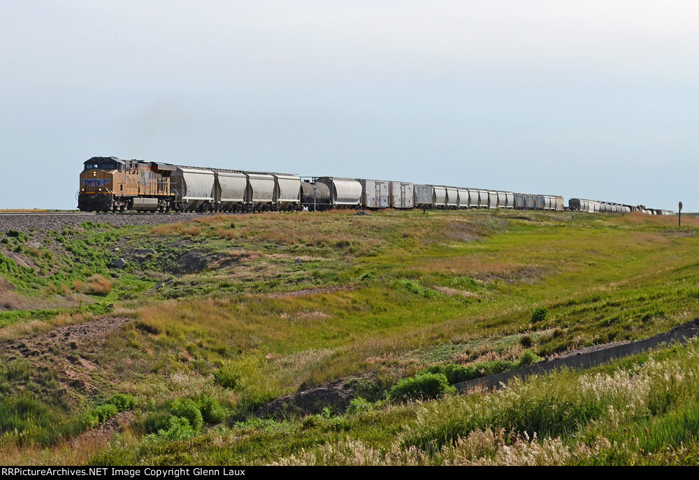One unit wonder UP 7726 hauling mixed freight westbound
